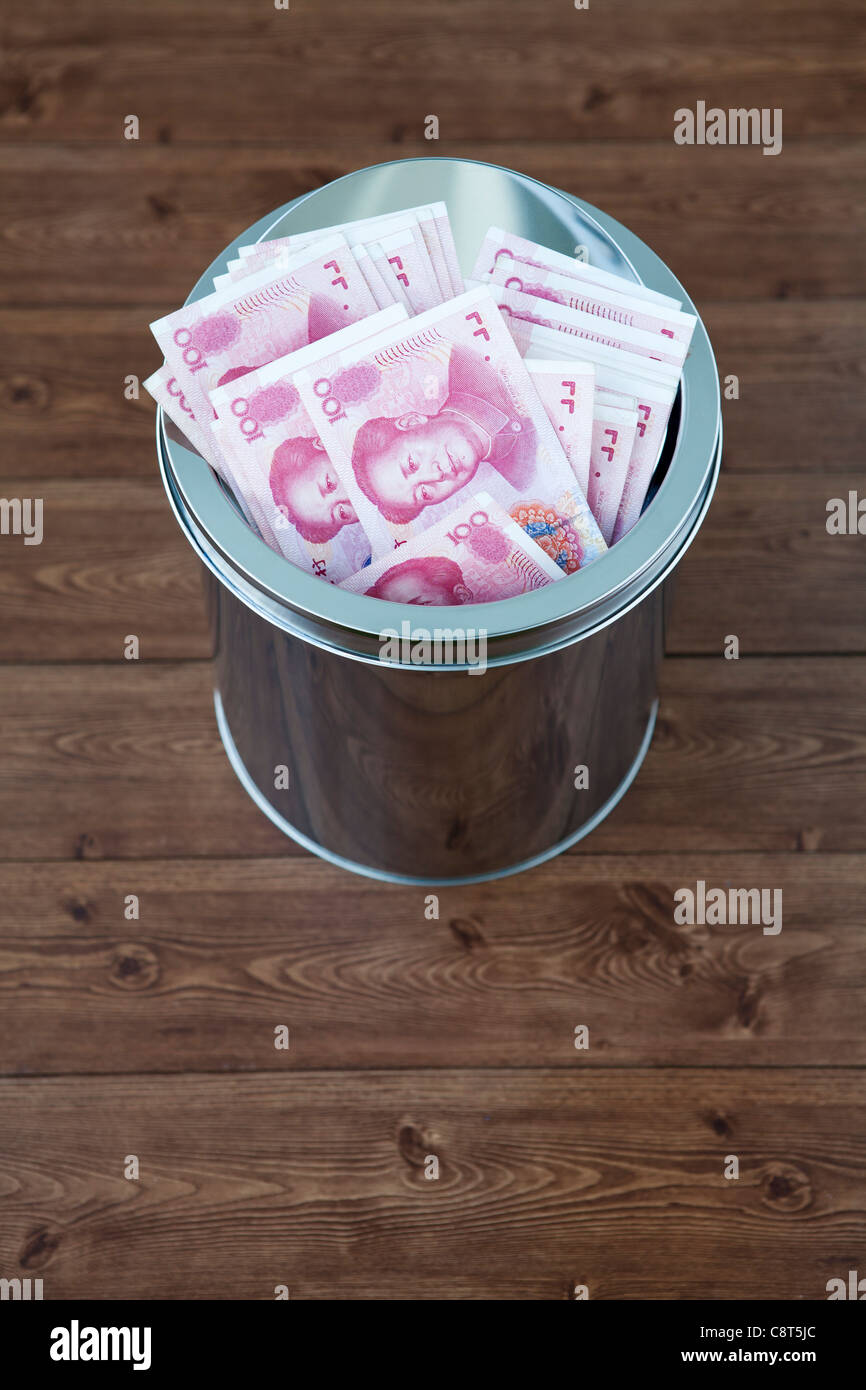 Dustbin And Currency Stock Photo - Alamy