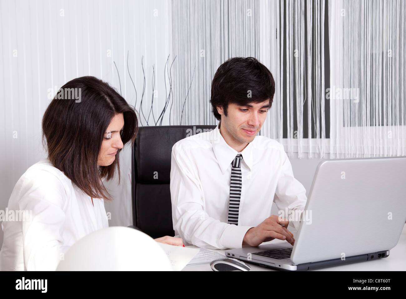 Modern team working at the office Stock Photo - Alamy