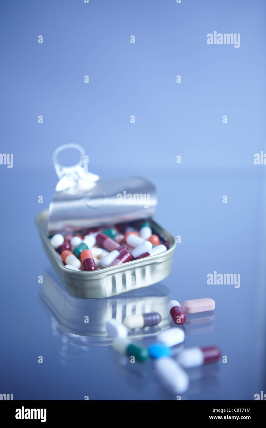 Box full of multi-colored capsules Stock Photo - Alamy
