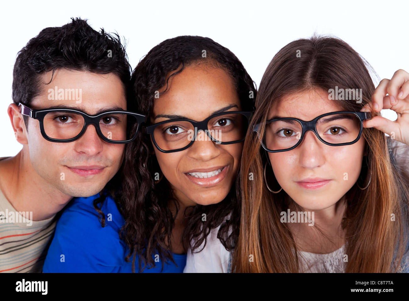 Three smart student friends looking with eyeglasses Stock Photo - Alamy