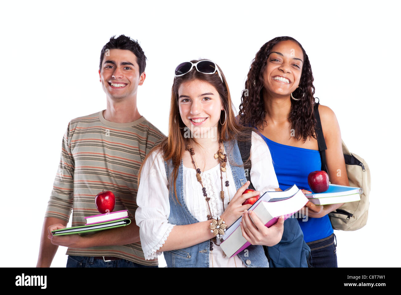Three happy students holding books (isolated on white Stock Photo - Alamy