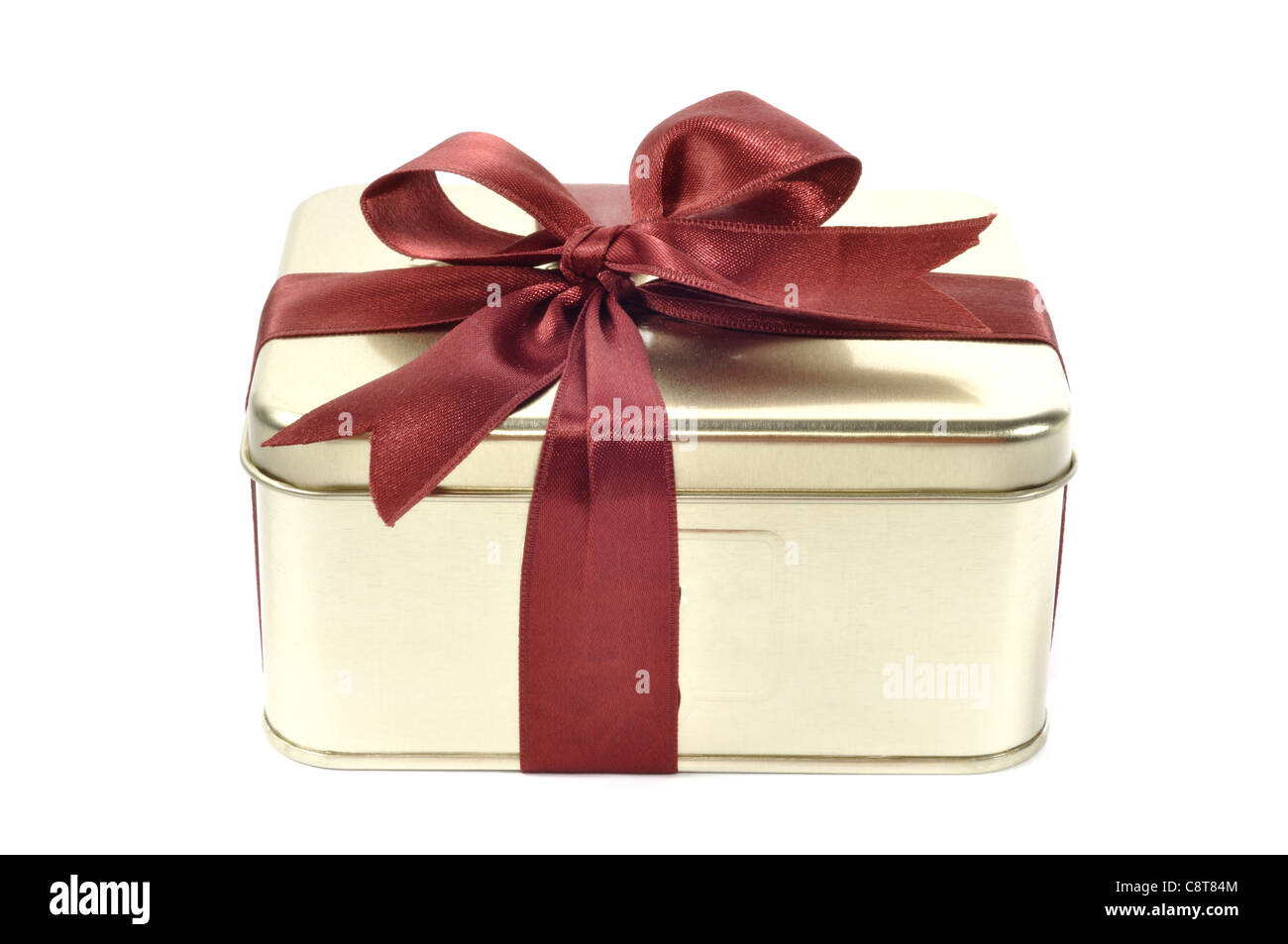 Metal gift box with red ribbon, on a white background Stock Photo - Alamy