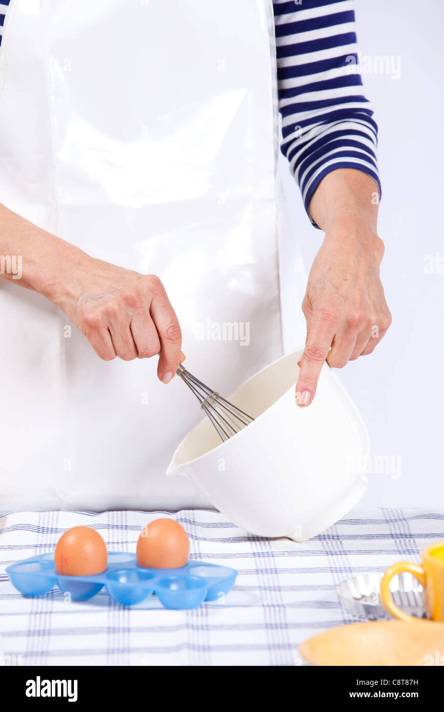 Hands cakes baking bowl hi-res stock photography and images - Alamy