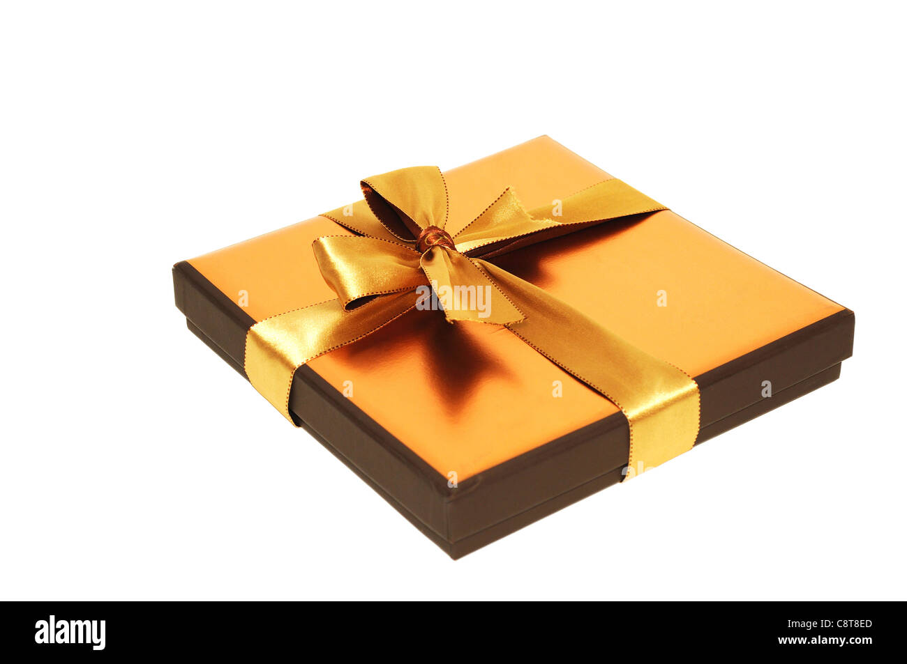 Gift box with gold ribbon, on a white background Stock Photo - Alamy