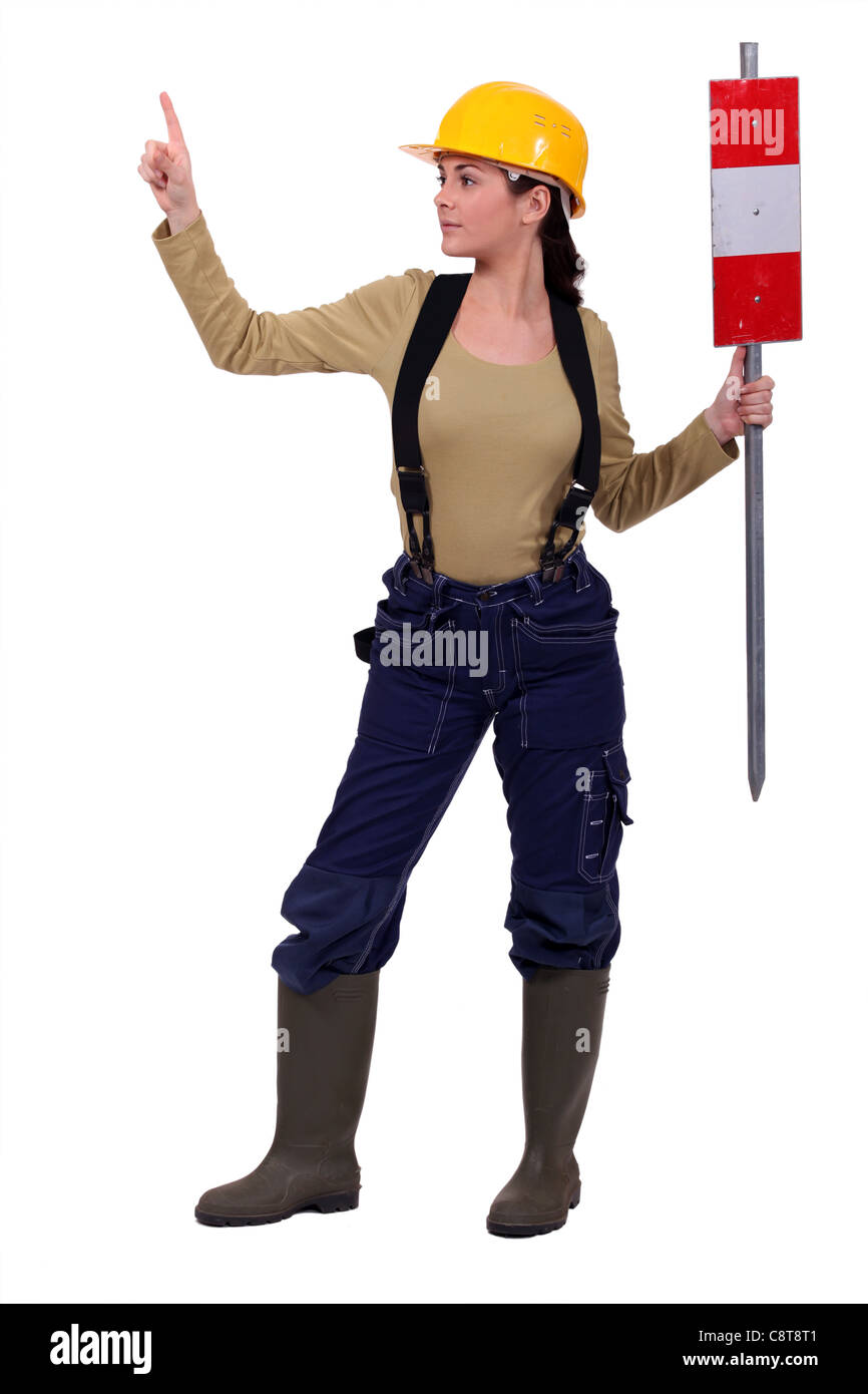 Female construction holding warning sign Cut Out Stock Images ...
