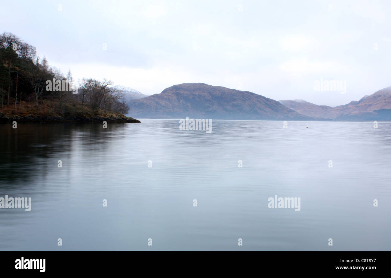 Misty view over a scottish loch Stock Photo - Alamy