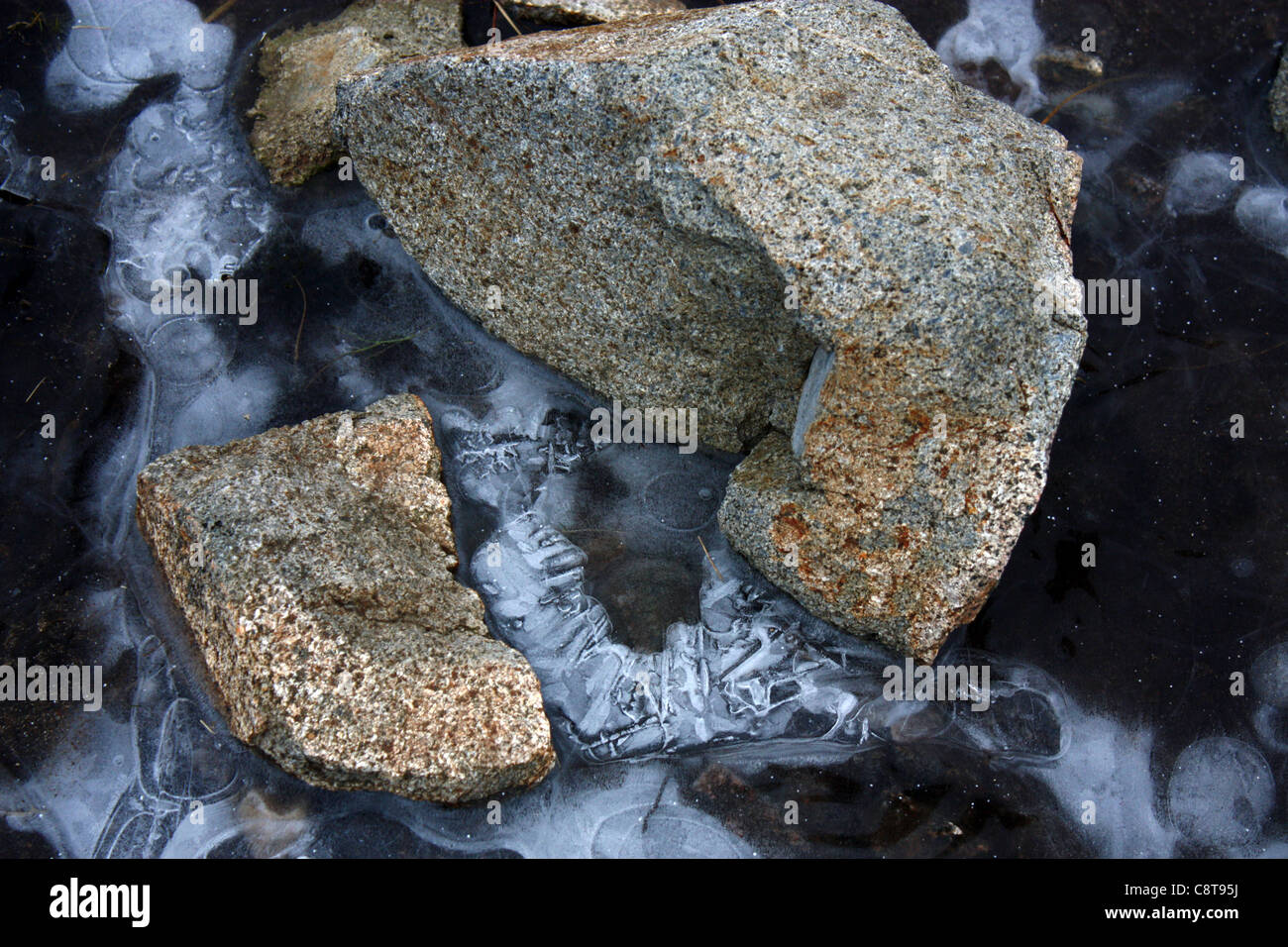 Rocks in a frozen stream Stock Photo - Alamy