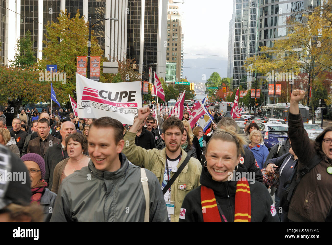 Delegates from the Canadian national labour union CUPE-SCFP march ...
