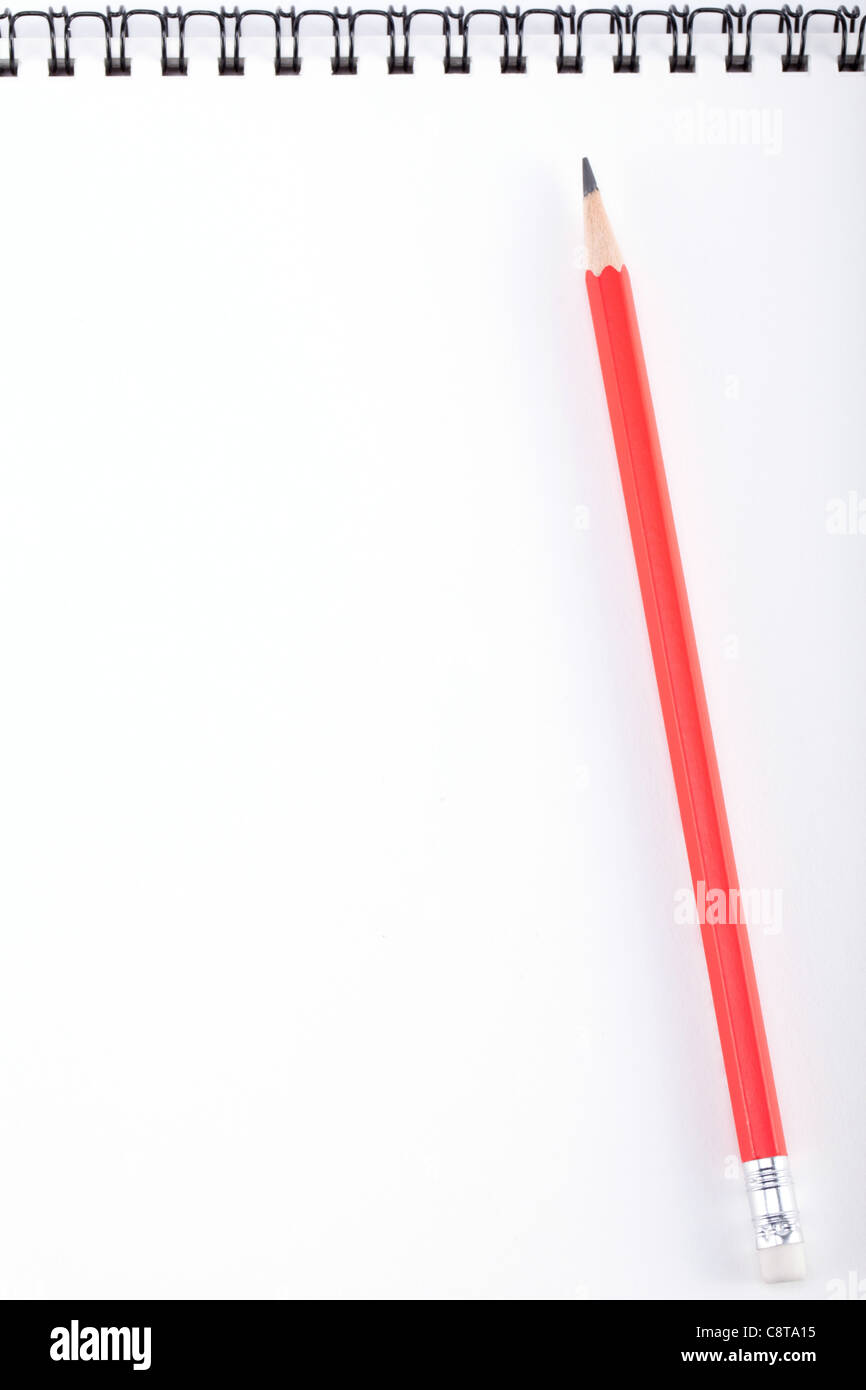 Red Pencil On A Pad Stock Photo - Alamy