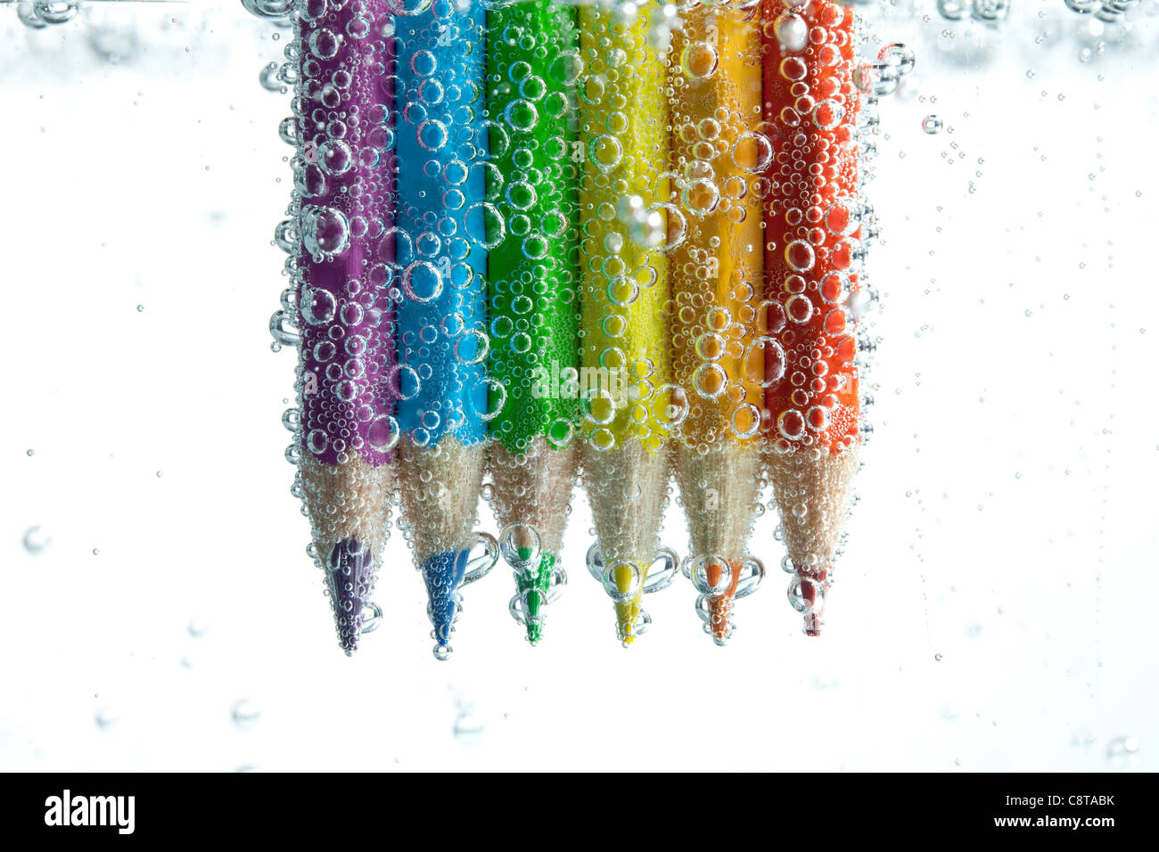 Multi Colored Pencils Under Water With Bubbles Stock Photo - Alamy