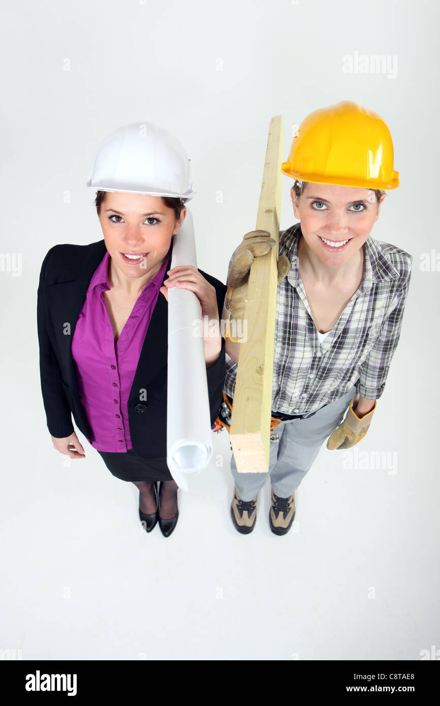 Engineer and construction worker side-by-side Stock Photo - Alamy