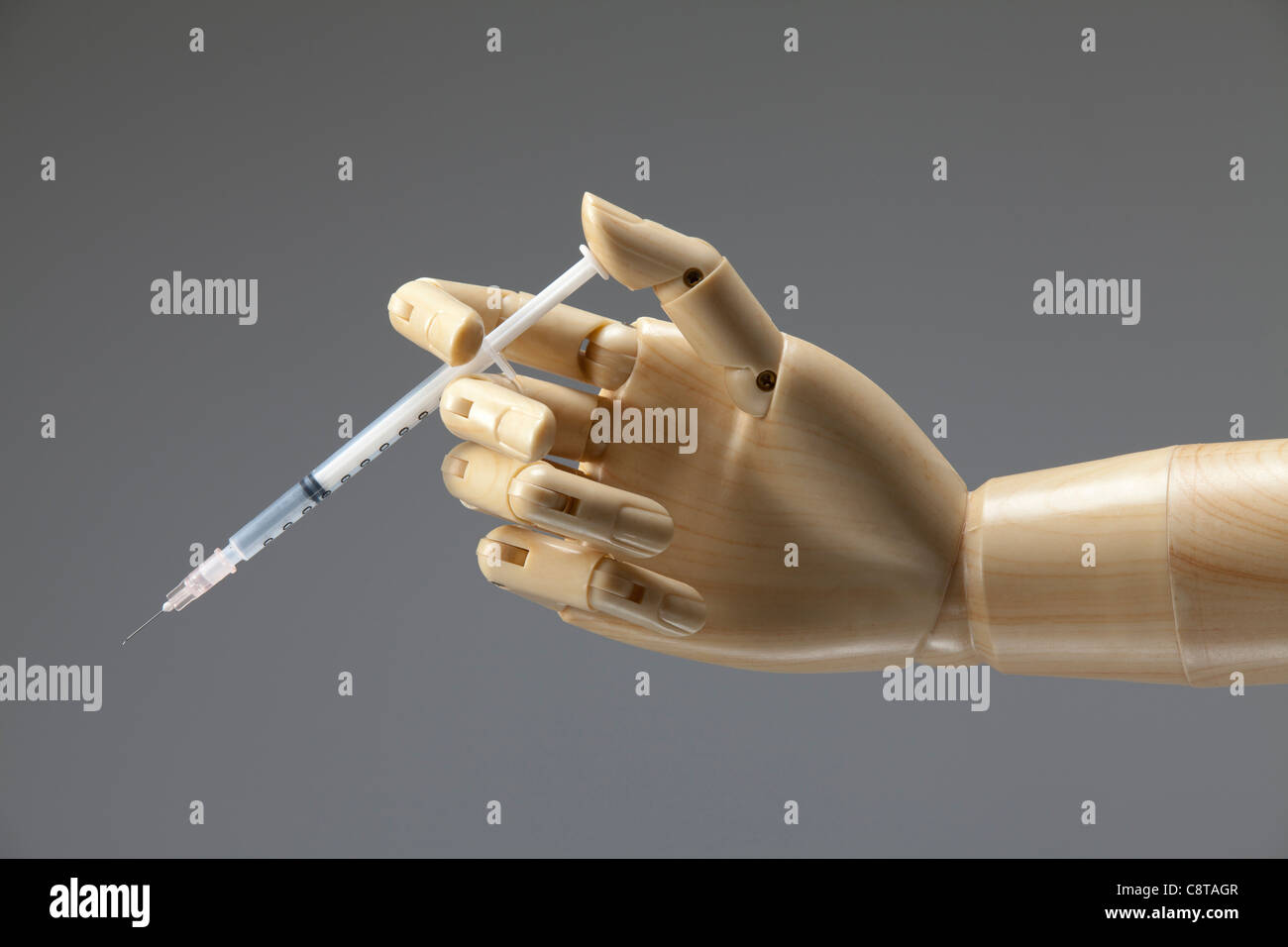 Robot Holding Injection Stock Photo - Alamy