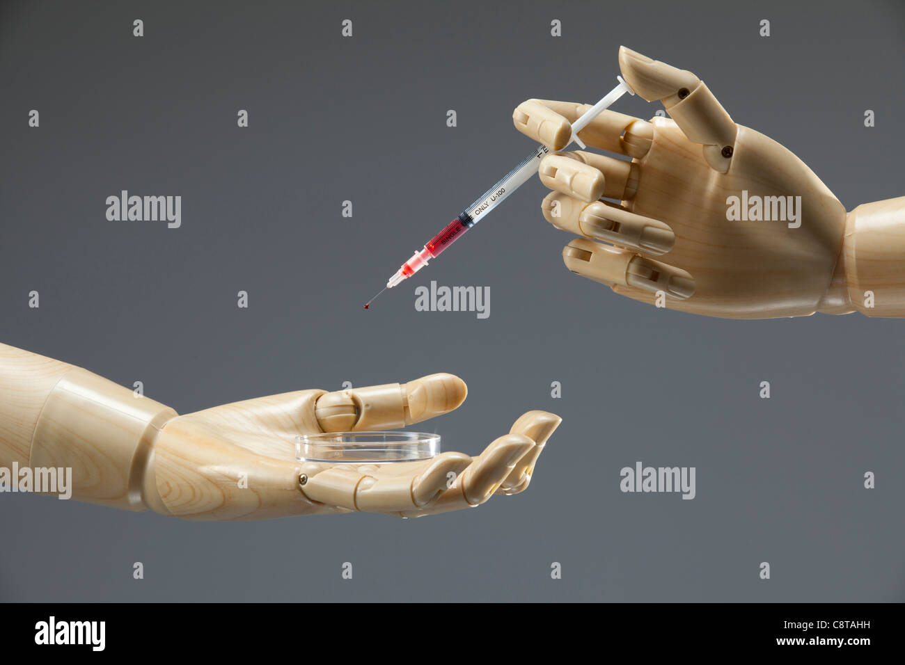 Robot Holding Injection Stock Photo - Alamy