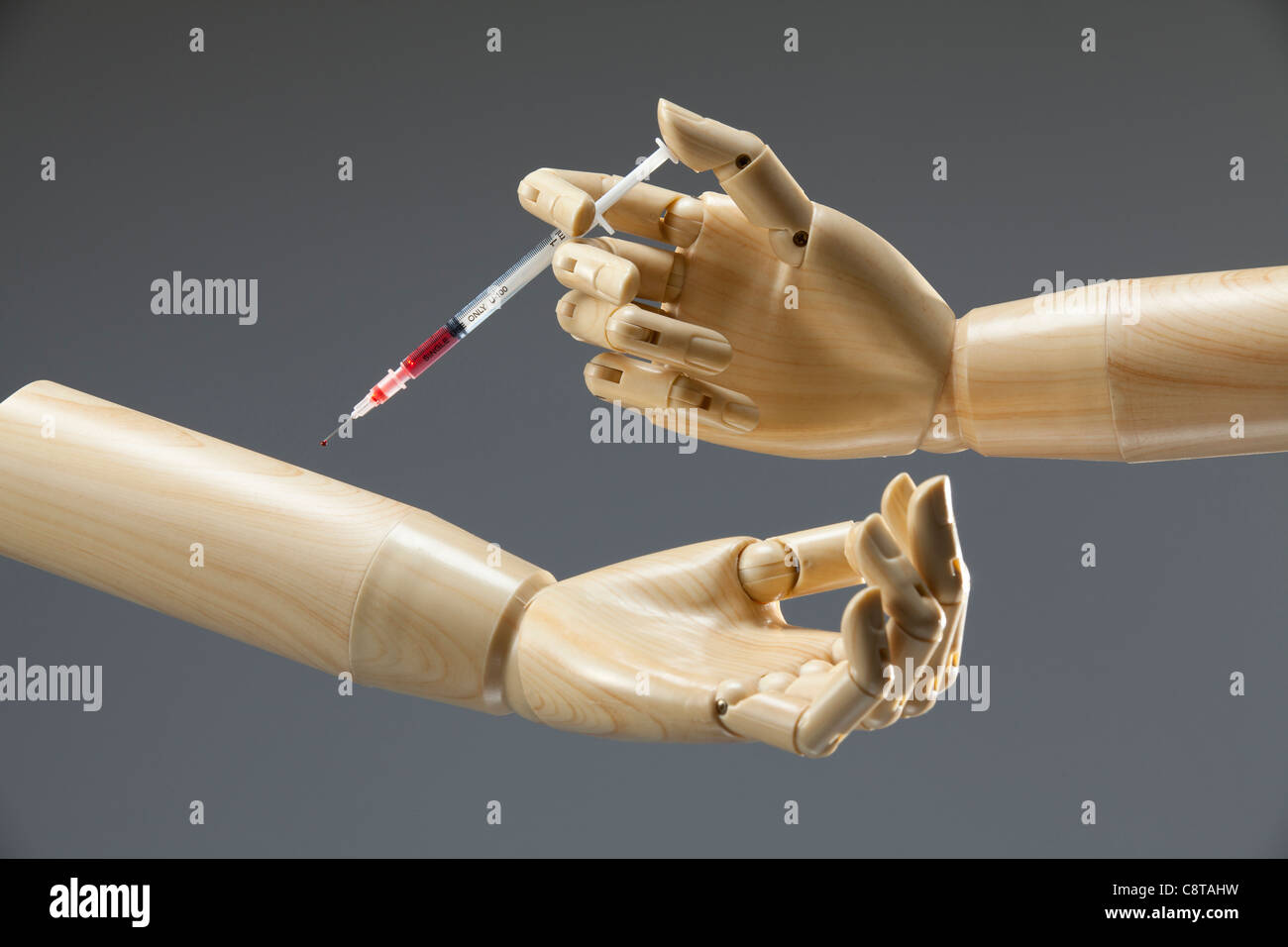 Robot Holding Injection Stock Photo - Alamy