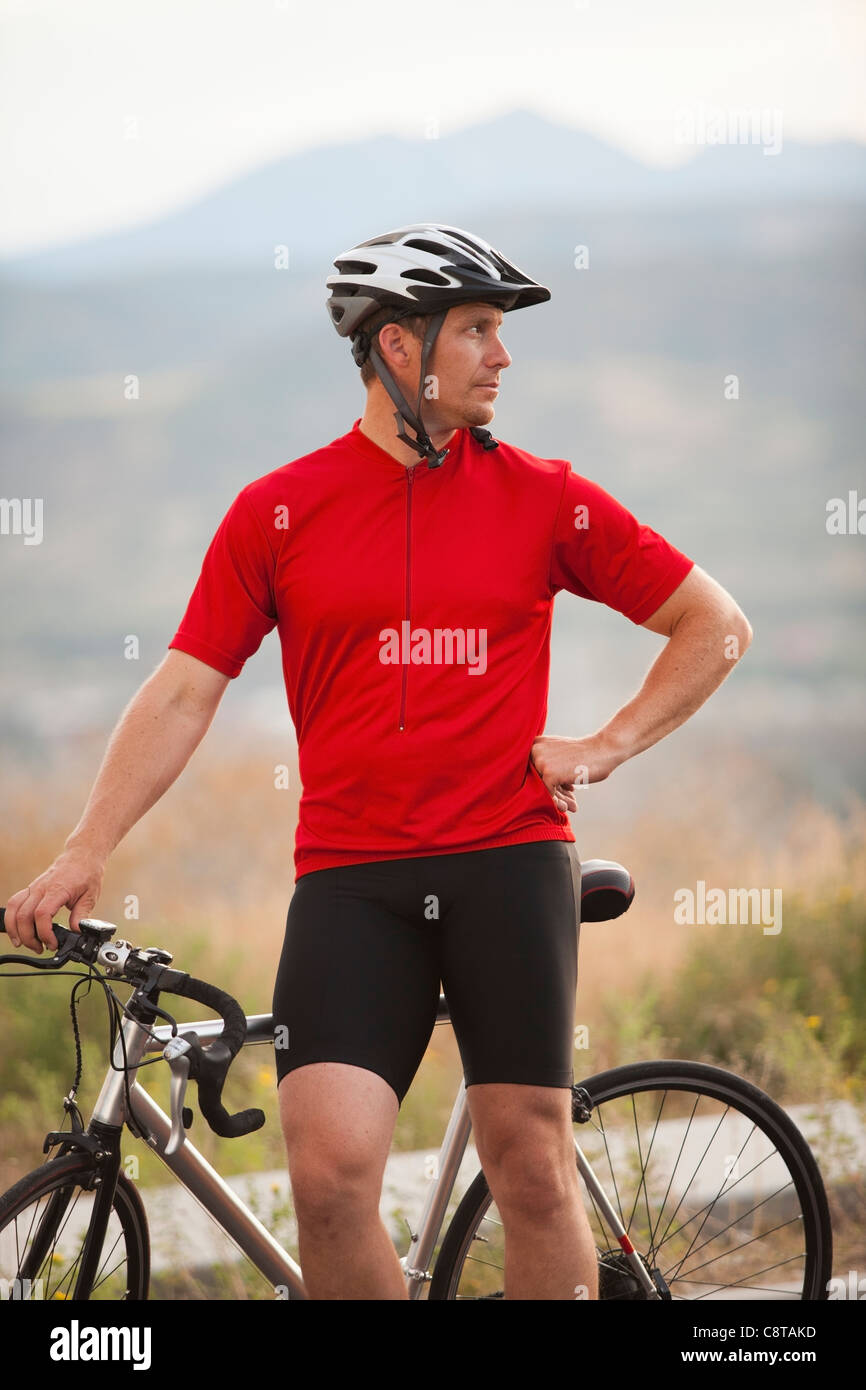 Man on bike profile hi-res stock photography and images - Alamy