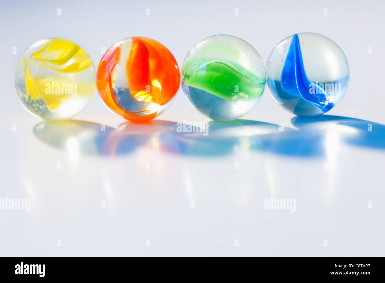 Four marbles hi-res stock photography and images - Alamy