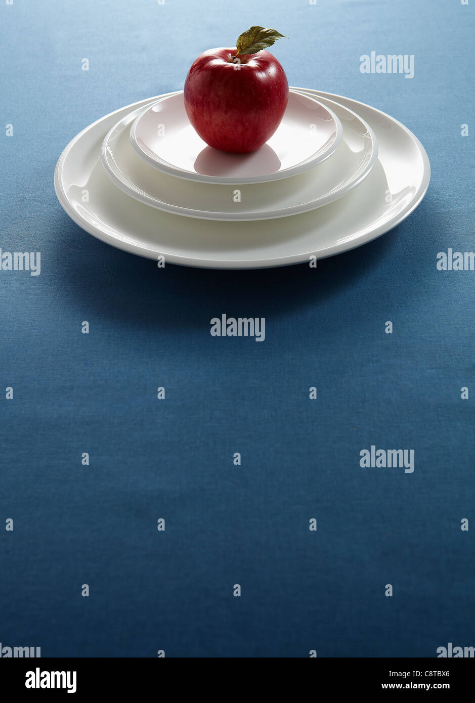 Apple With Three Plates Stock Photo - Alamy