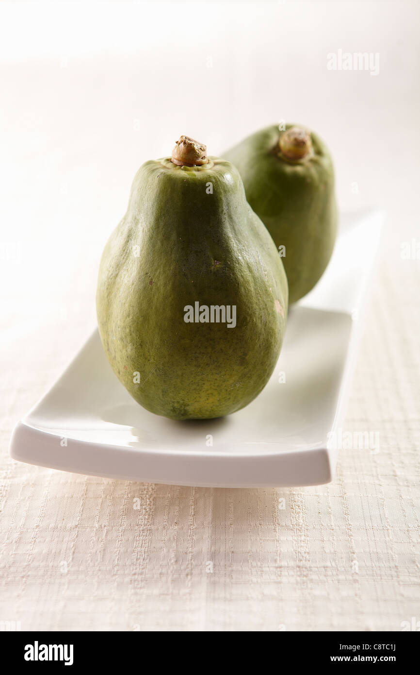 Two Avocado And Tray Stock Photo - Alamy