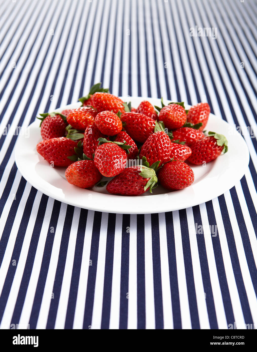 Strawberry In A Plate Stock Photo - Alamy