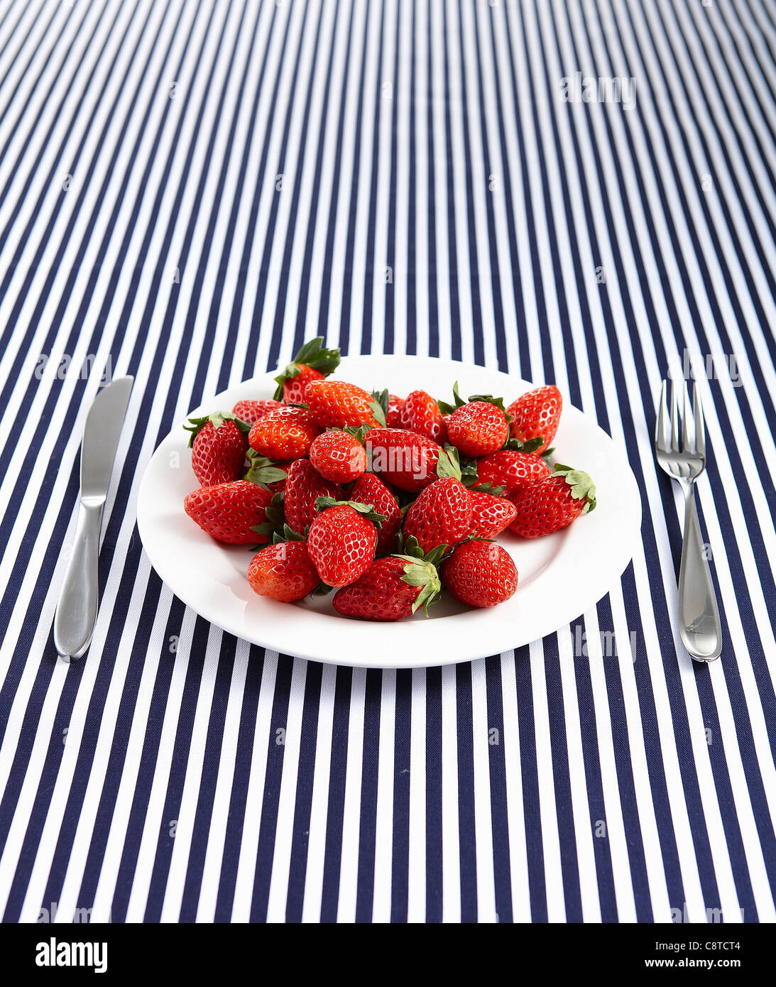 Strawberry In A Plate Stock Photo - Alamy