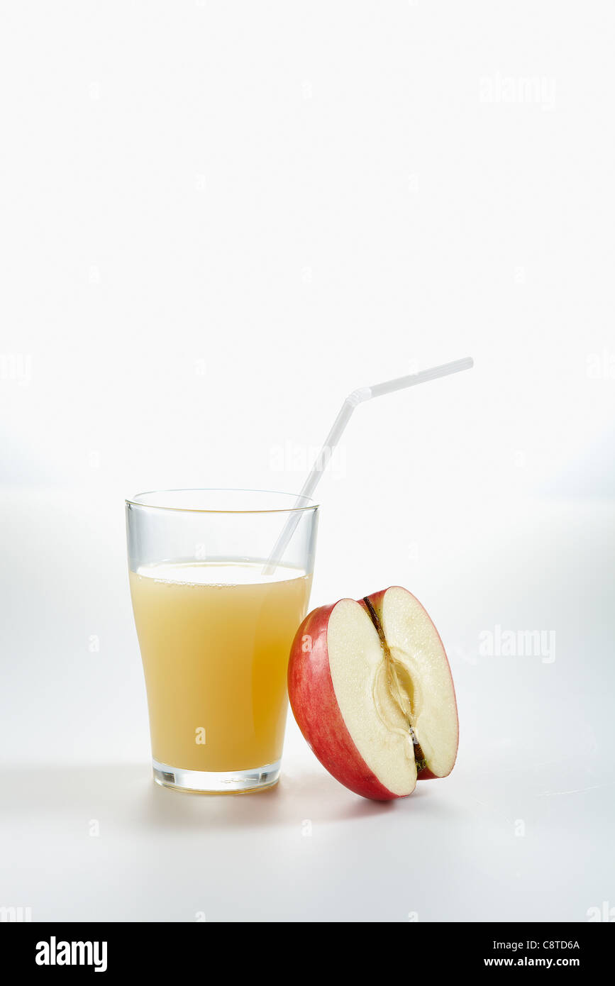 Juice In A Glass With Slice Of Fruit Stock Photo - Alamy