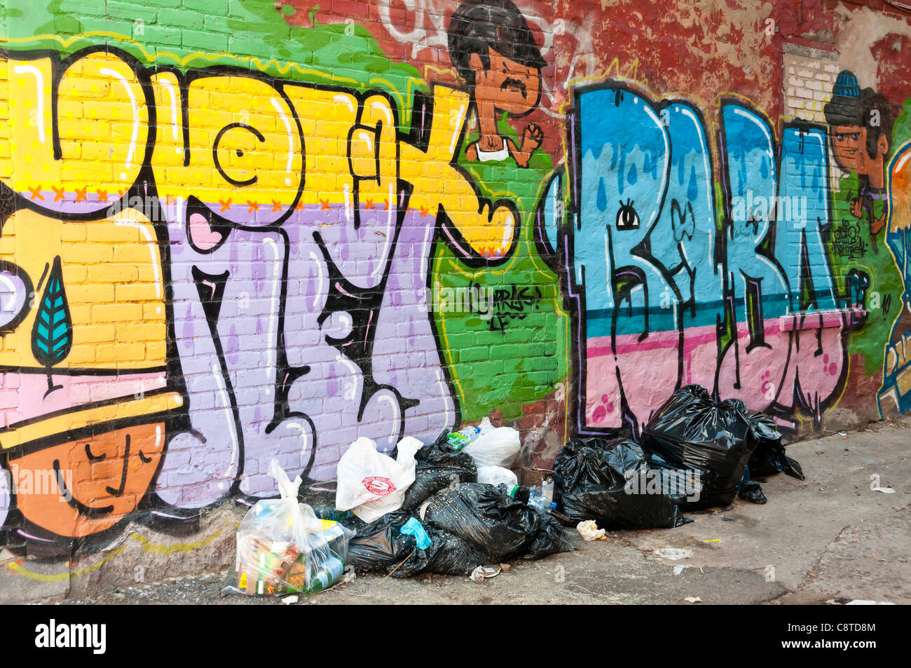 Graffiti and garbage Stock Photo - Alamy
