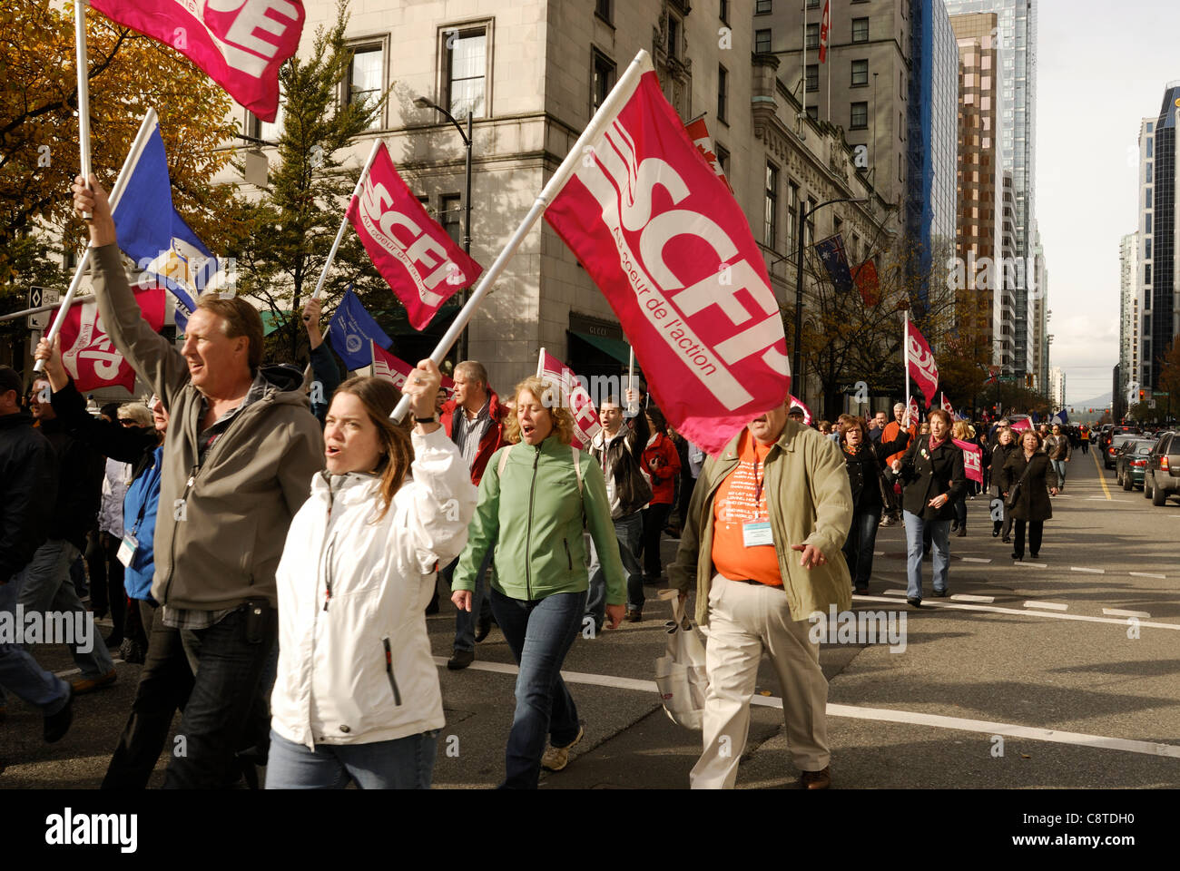 Delegates from the Canadian national labour union CUPE-SCFP march ...