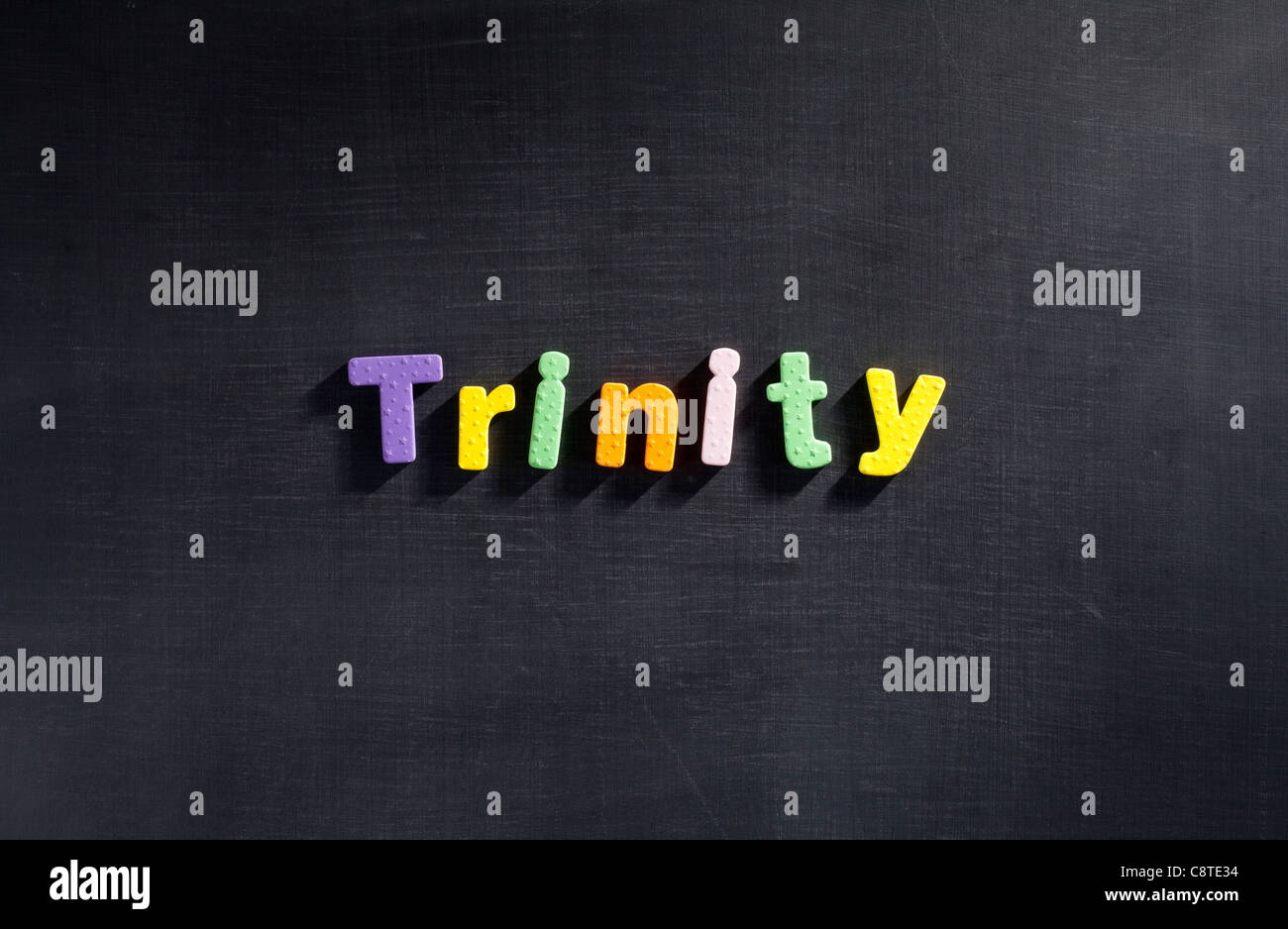 Single word 'trinity' in multi colored alphabets Stock Photo - Alamy