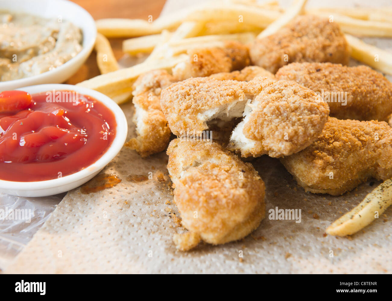 Close up of fried chicken fingers Stock Photo - Alamy