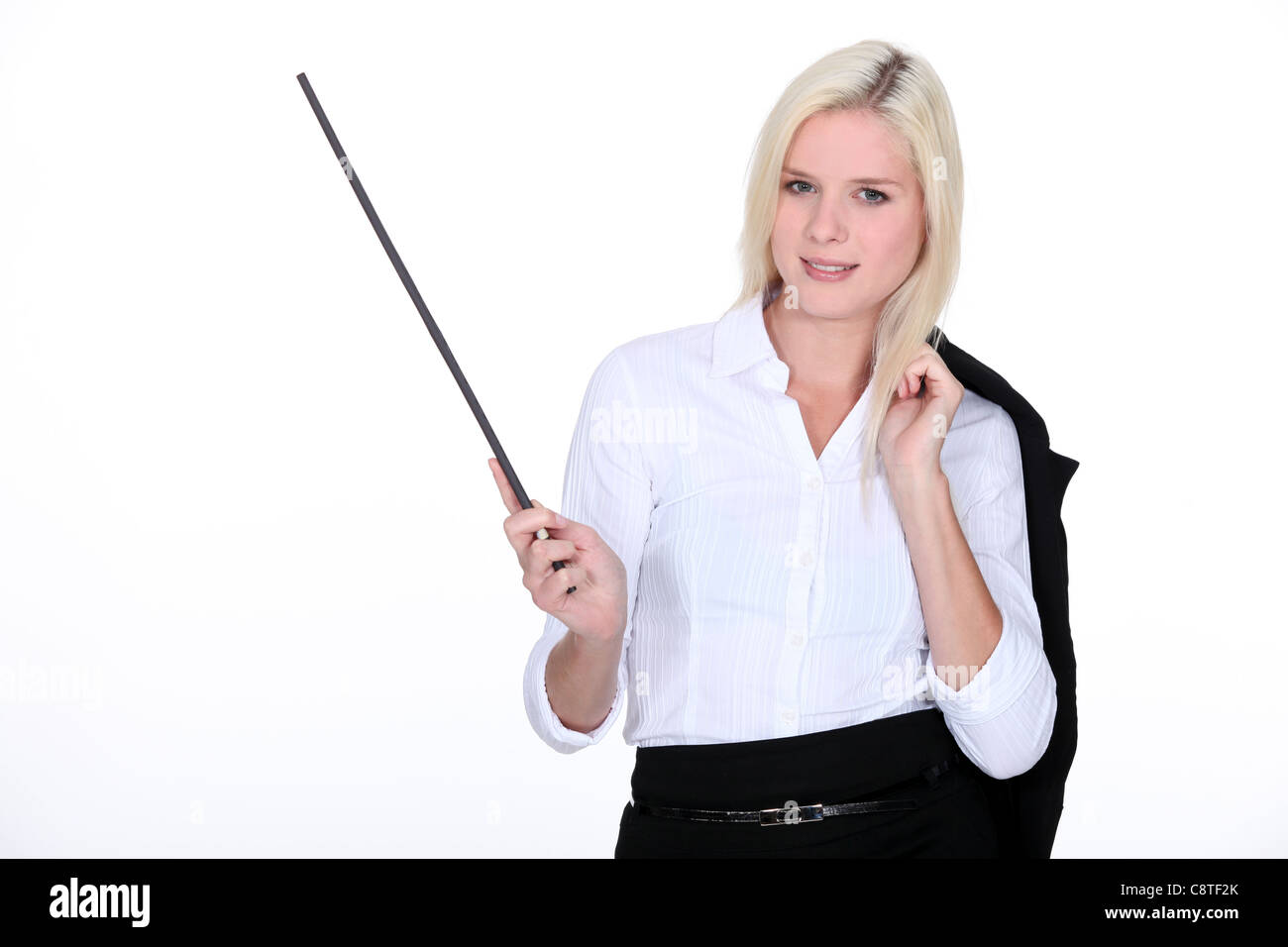 Businesswoman pointing with a stick Stock Photo - Alamy