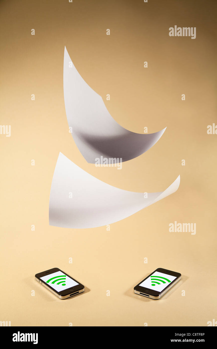 Mobile Phone With Papers Stock Photo - Alamy