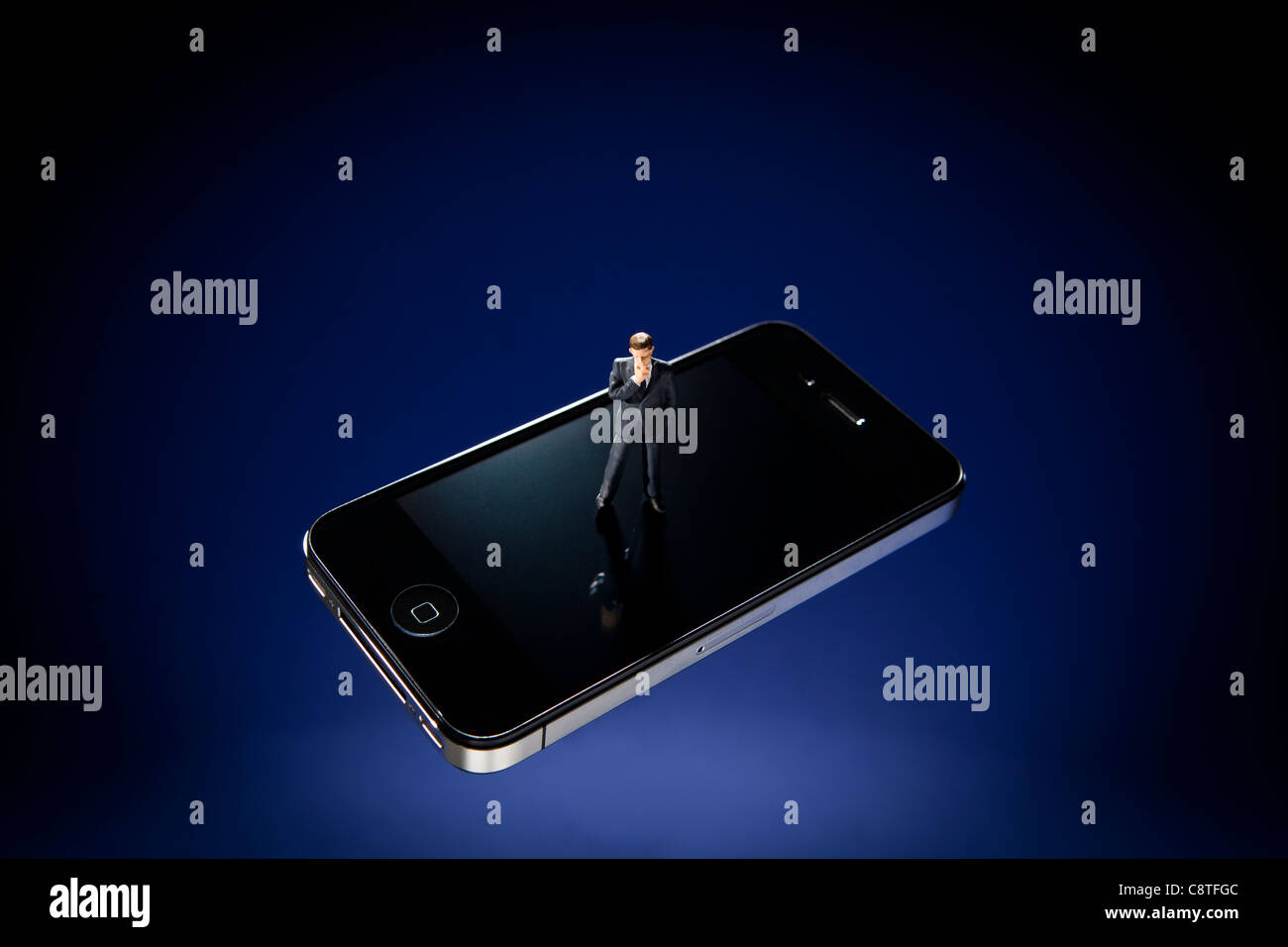 Man Standing On Mobile Phone Stock Photo - Alamy