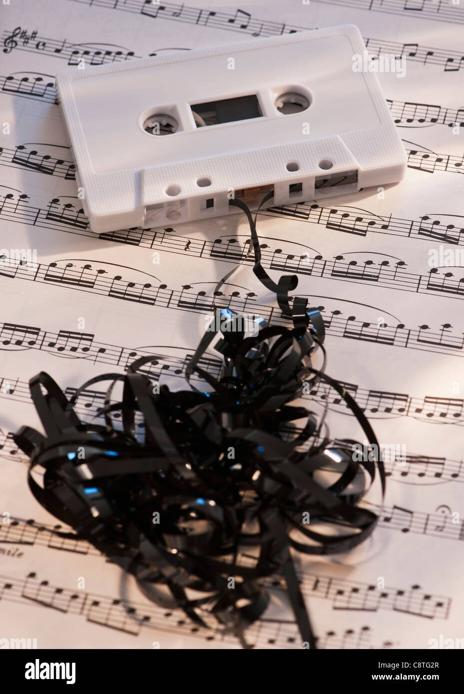 White mix tape on sheet music , studio shot Stock Photo - Alamy