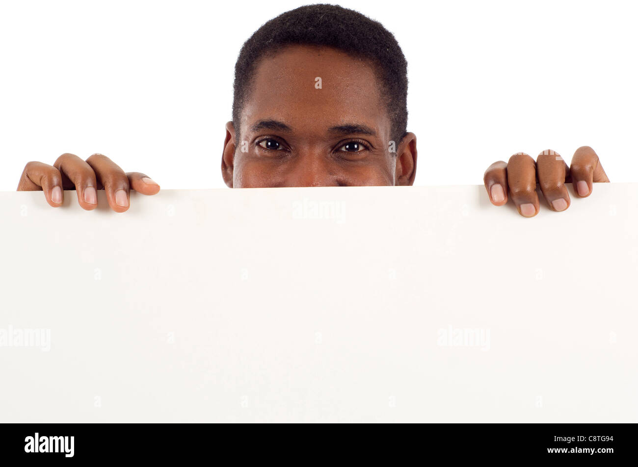 Happy smiling African American man holding a banner ad, sign showing ...