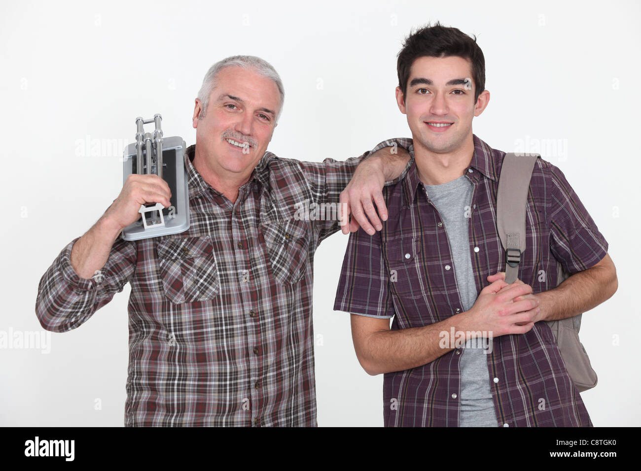 craftsman and apprentice posing Stock Photo - Alamy