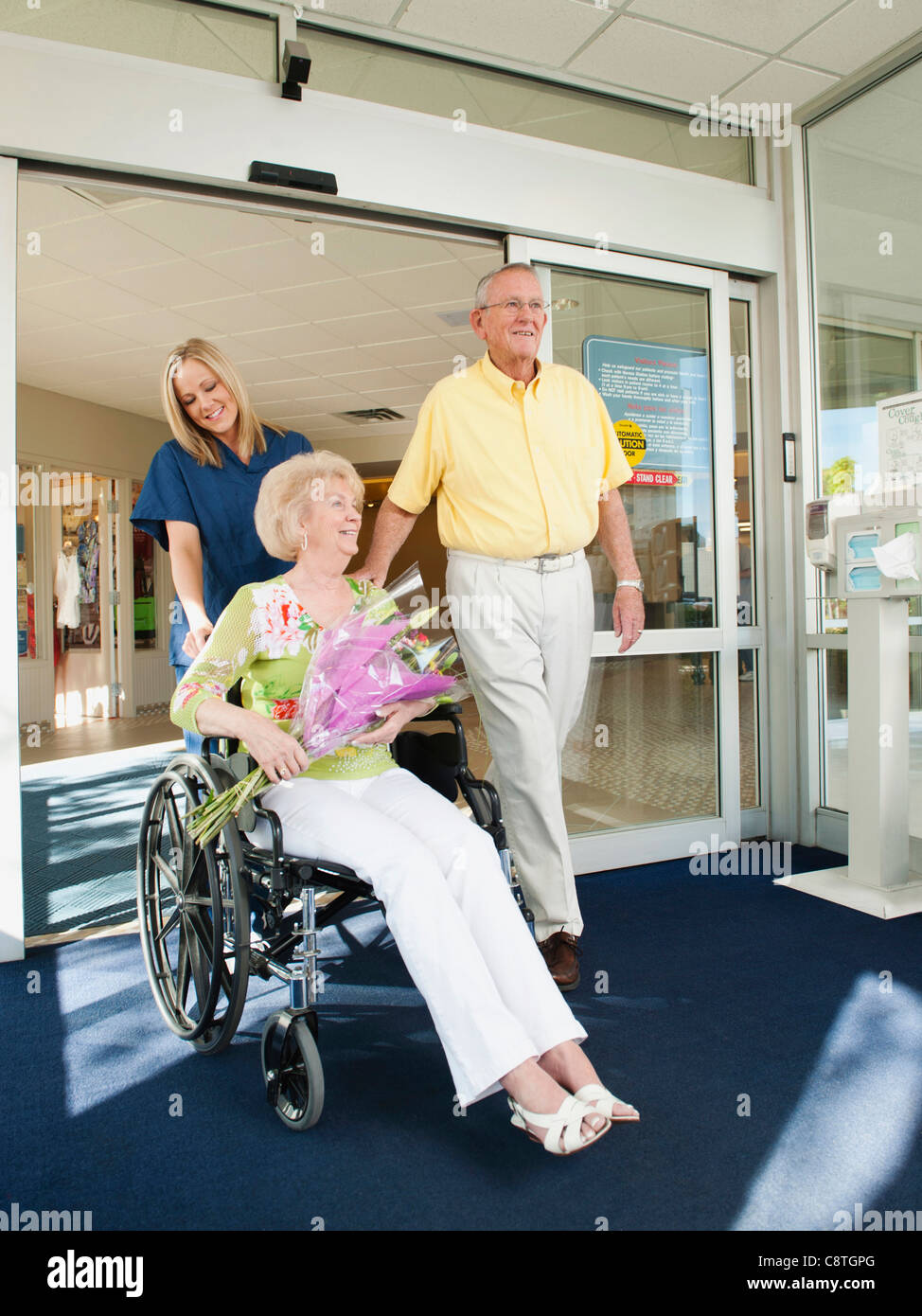 USA, Utah, Ogden, Senior people going out from hospital Stock Photo - Alamy