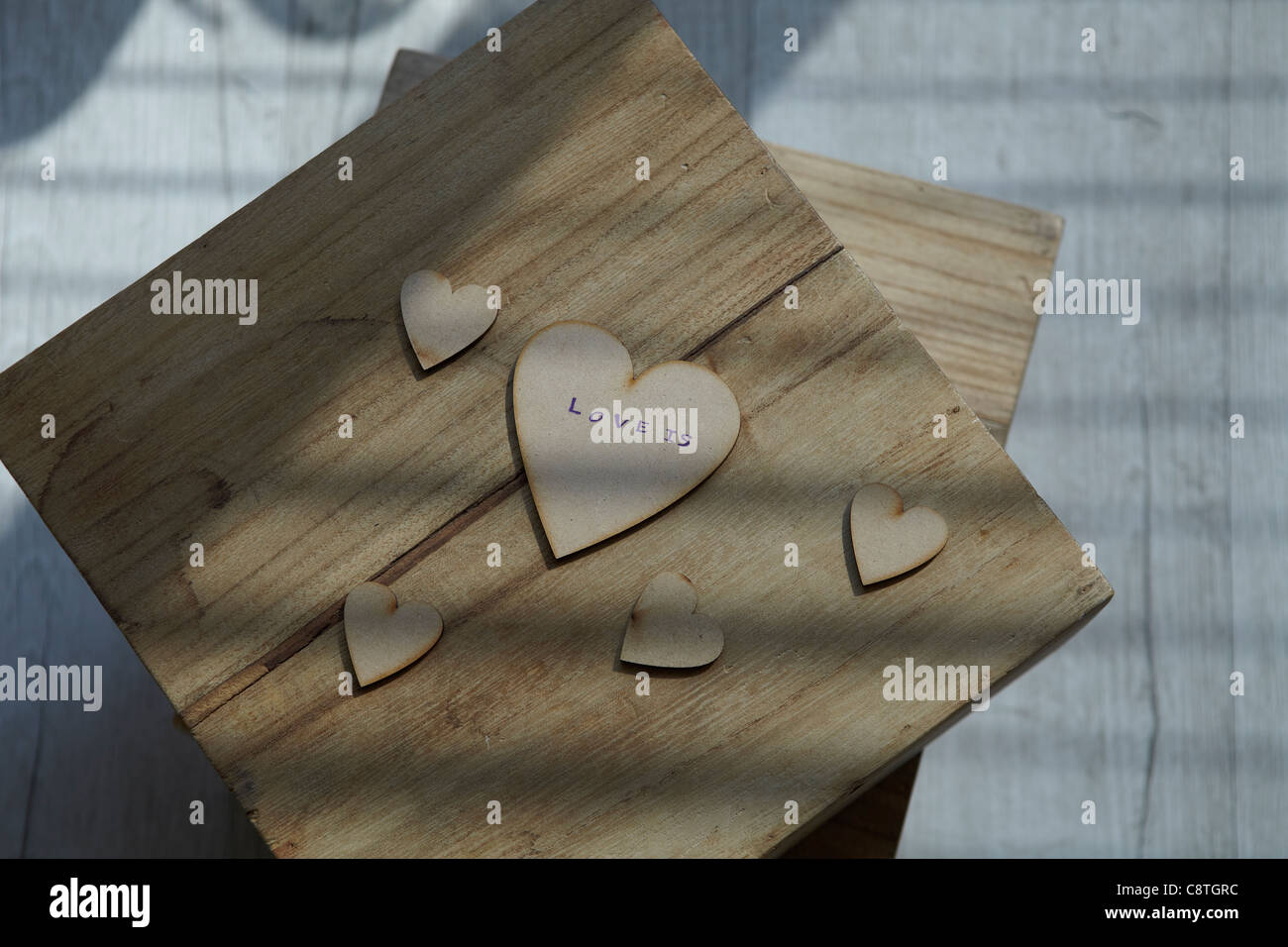 Hearts On A Table Stock Photo - Alamy