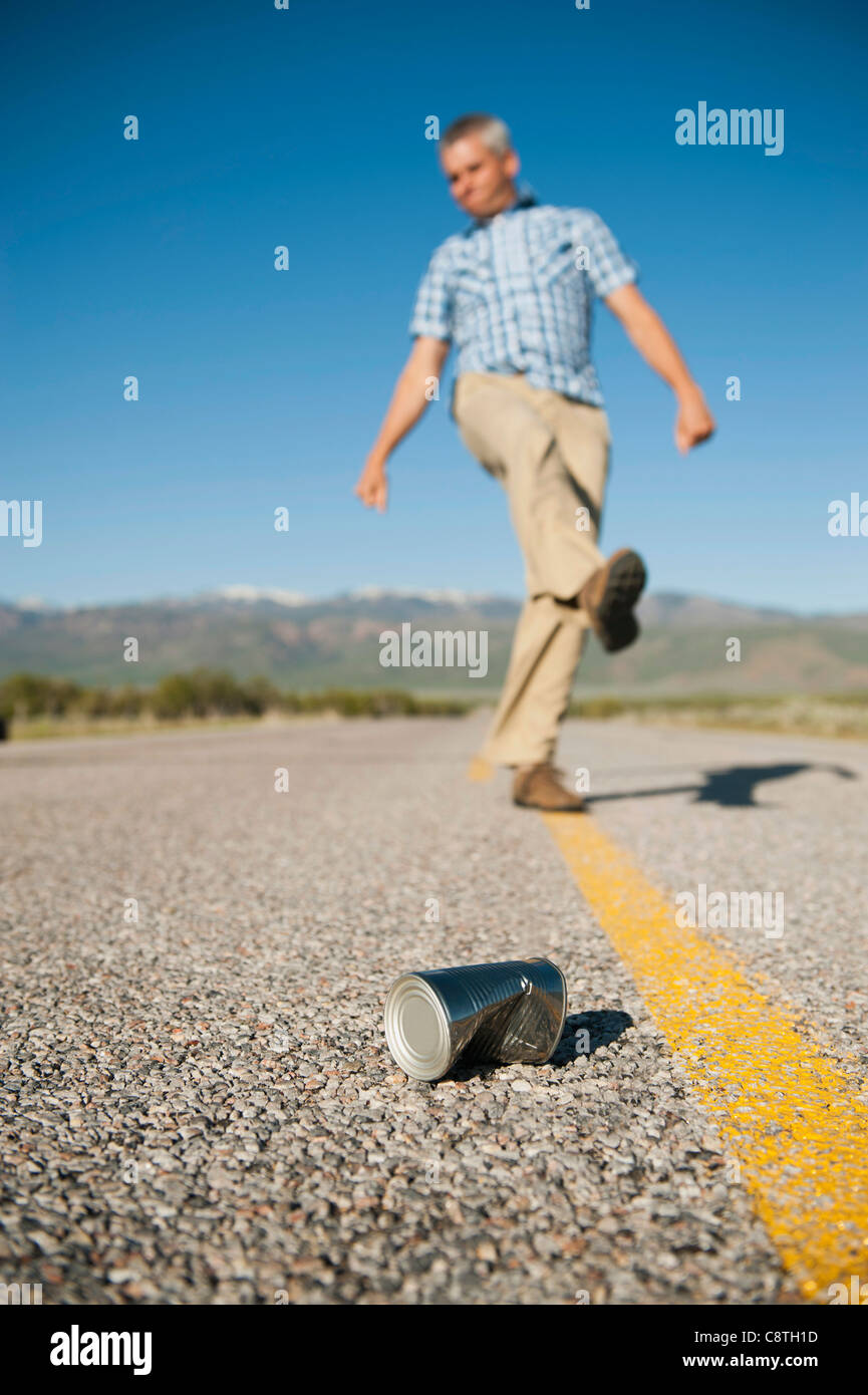 Kicking tin can hi-res stock photography and images - Alamy