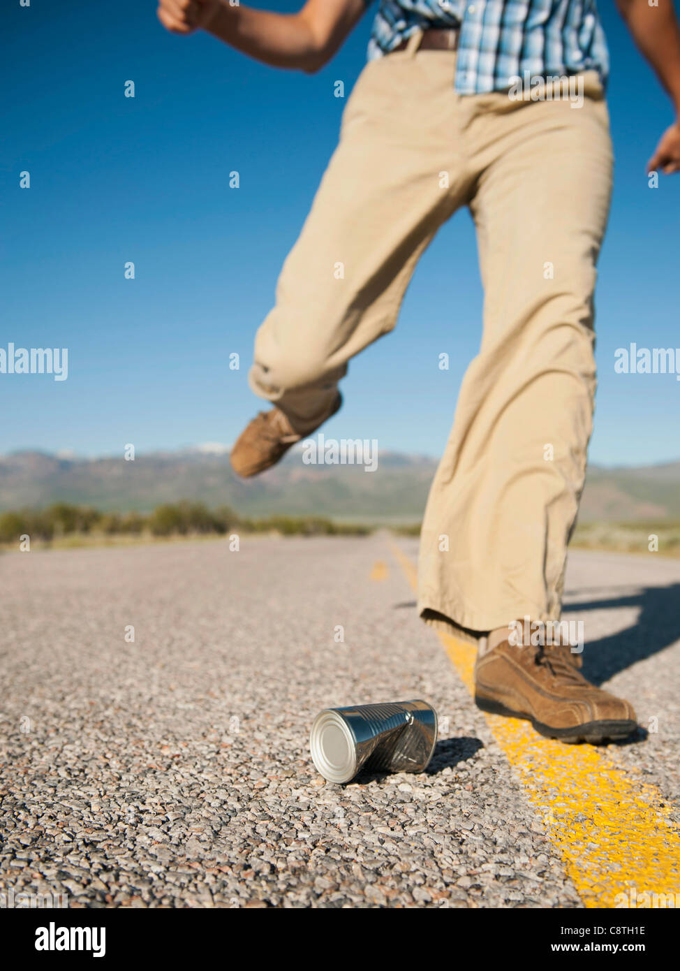 Kicking tin can hi-res stock photography and images - Alamy