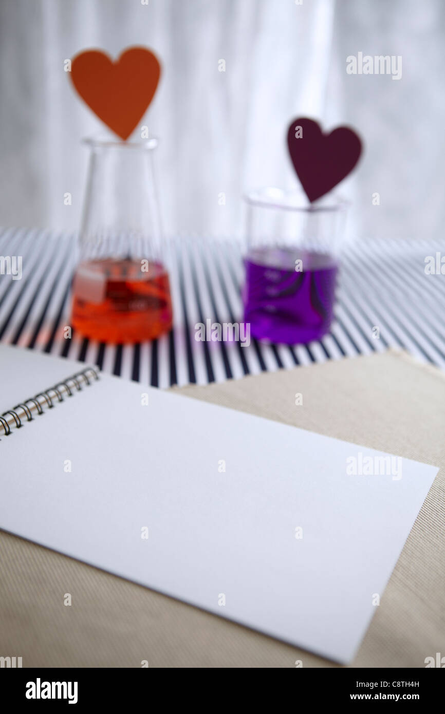 Laboratory Glassware With Notepad Stock Photo - Alamy