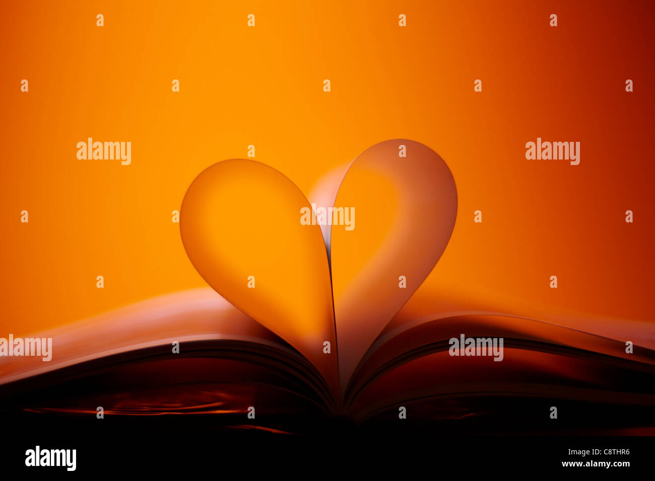 Heart inside book hi-res stock photography and images - Alamy