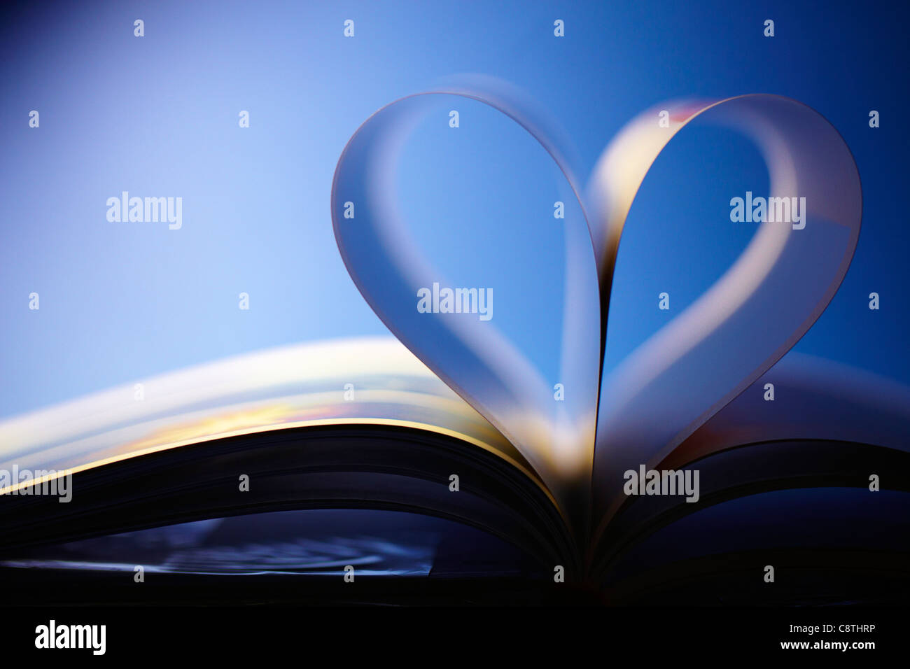 Heart inside book hi-res stock photography and images - Alamy