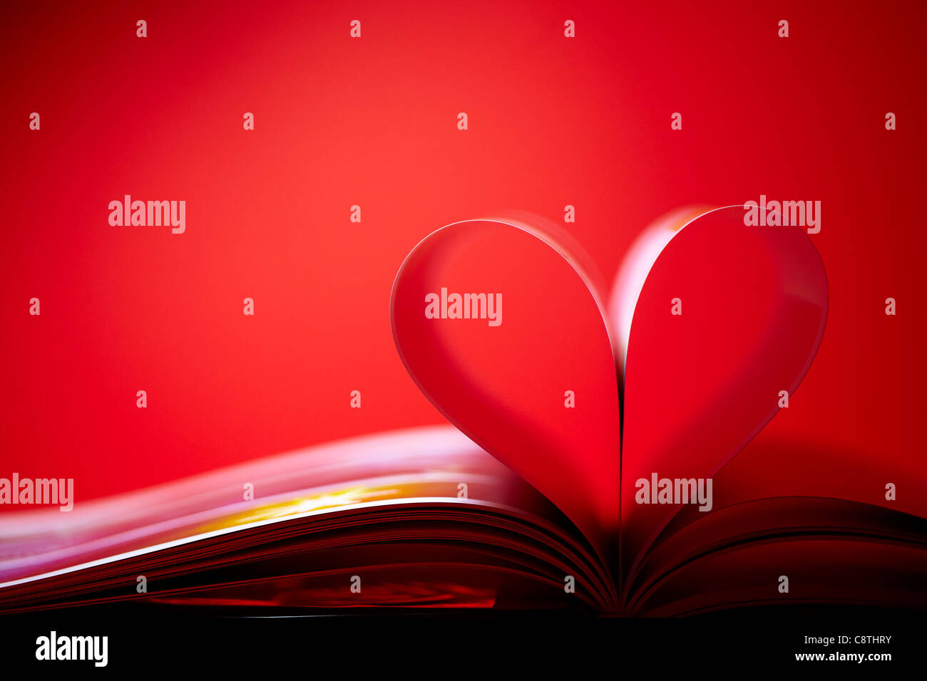 Heart inside book hi-res stock photography and images - Alamy