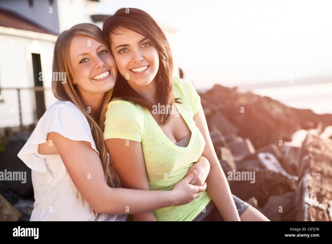 USA, Washington, Seattle, Portrait of two young women smiling Stock ...