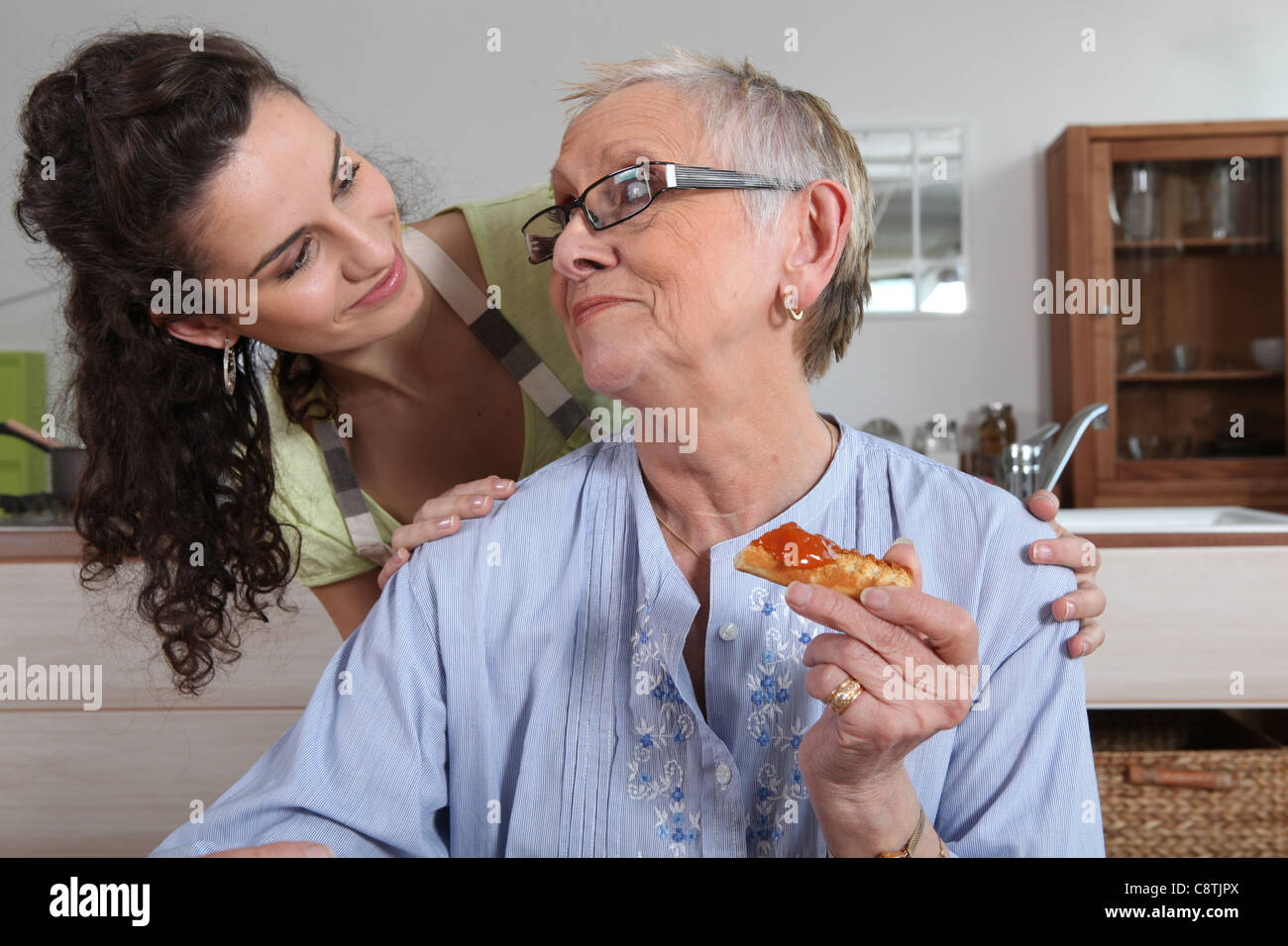 Young woman home help Stock Photo - Alamy