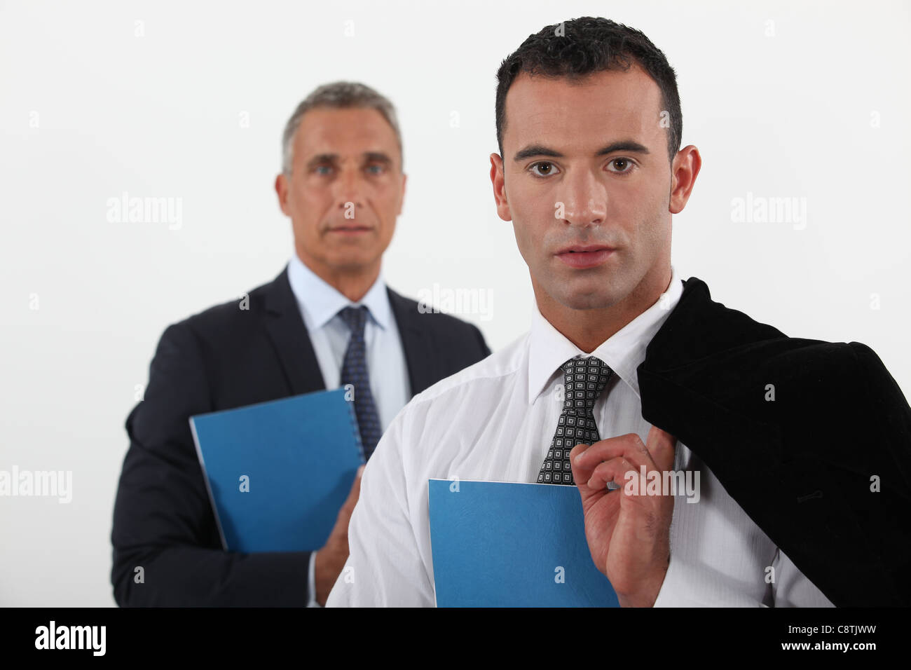 Young businessman posing with his boss Stock Photo - Alamy
