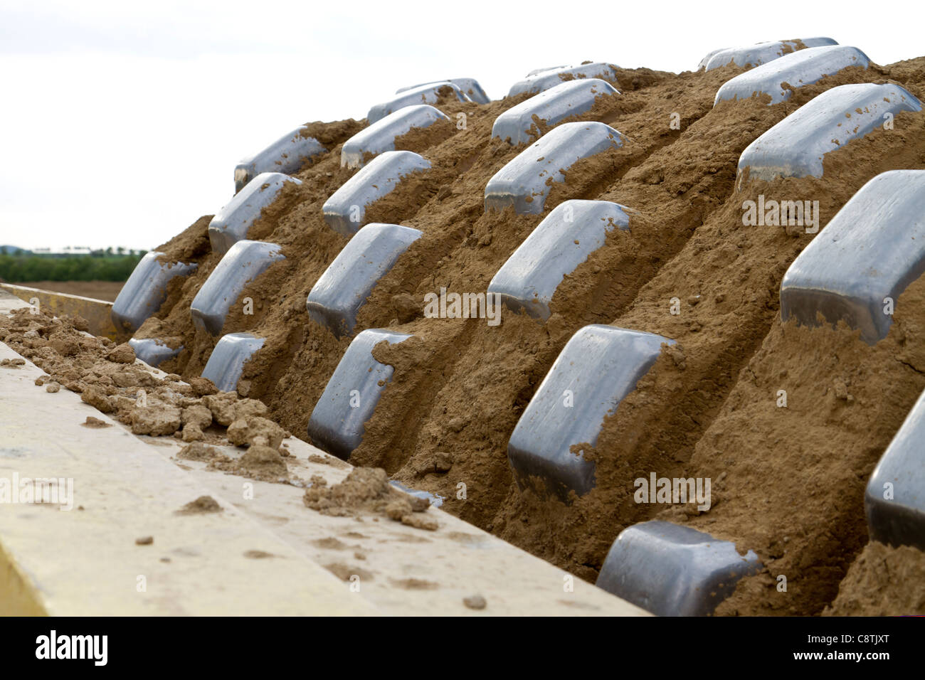 detail of heavy compactor with soil. horizontal image Stock Photo - Alamy