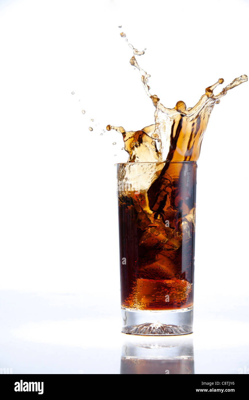 Drink Splashing In A Glass Stock Photo - Alamy