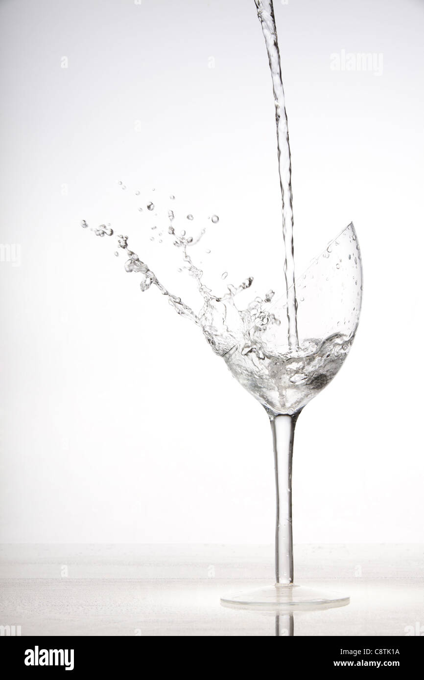 Water Pouring In A Glass Stock Photo - Alamy