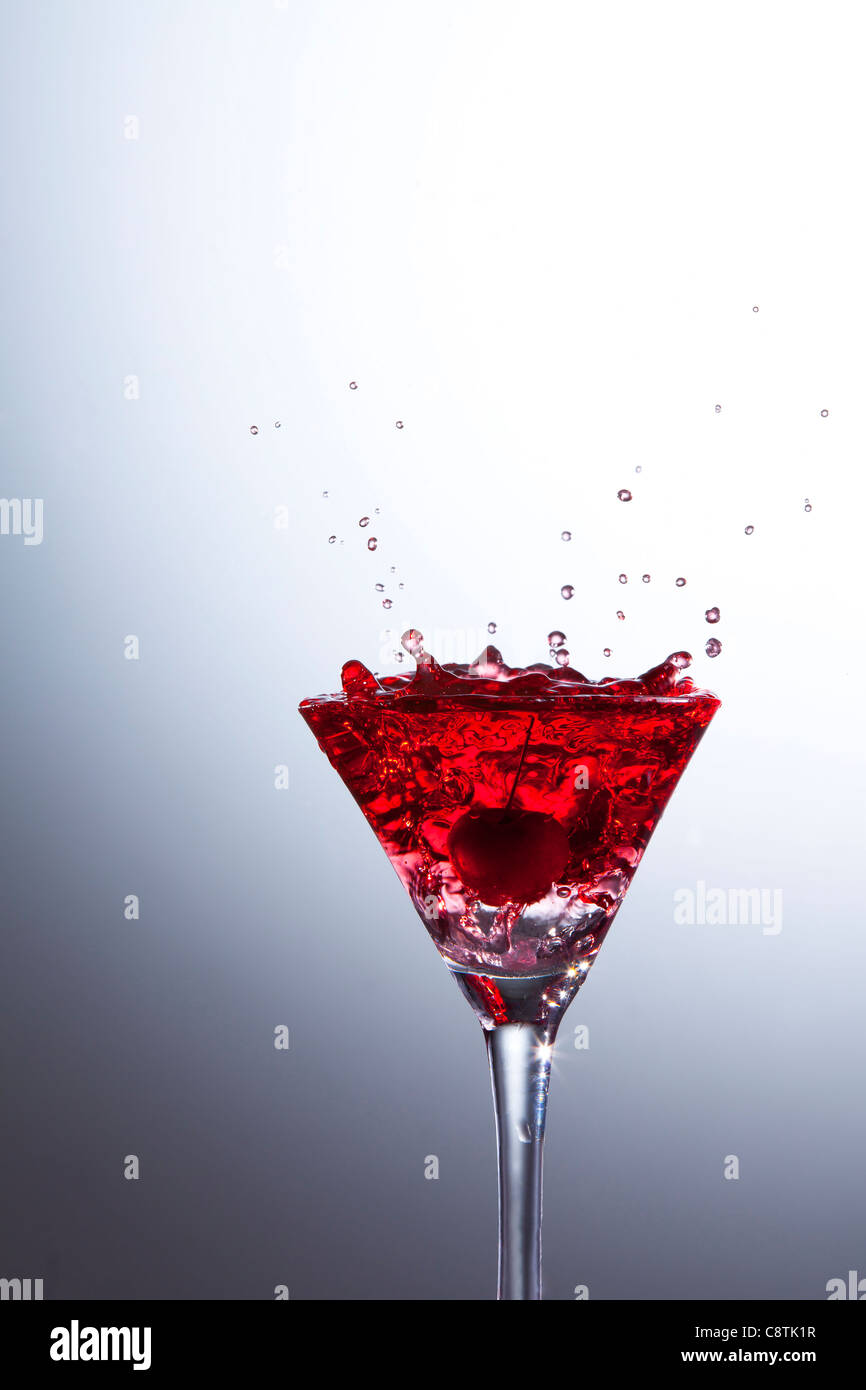 Drink Splashing In A Glass Stock Photo - Alamy